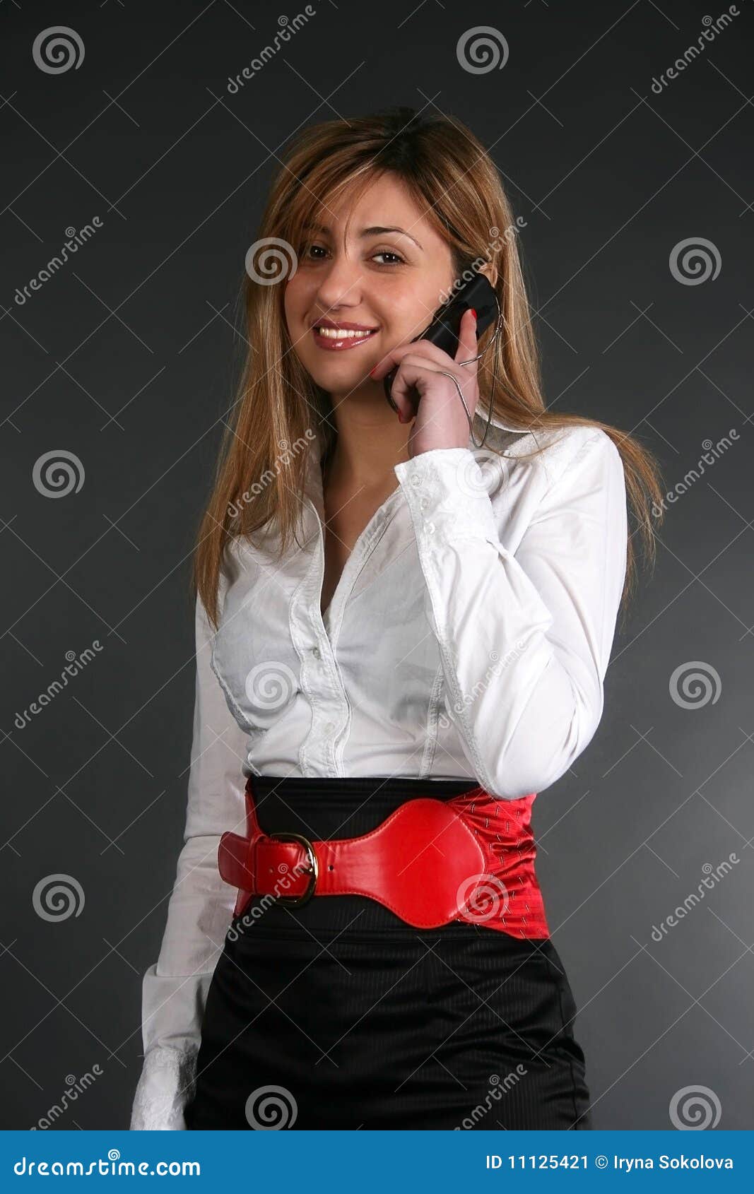 Lady speaking by phone stock image. Image of conversation - 11125421