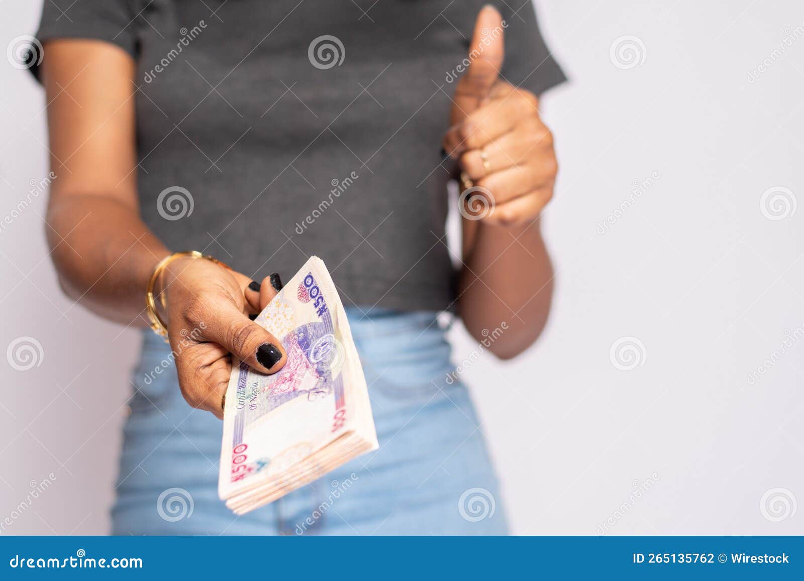 Lady Stretching Some Money Forward, Does Thumbs Up Stock Photo - Image ...