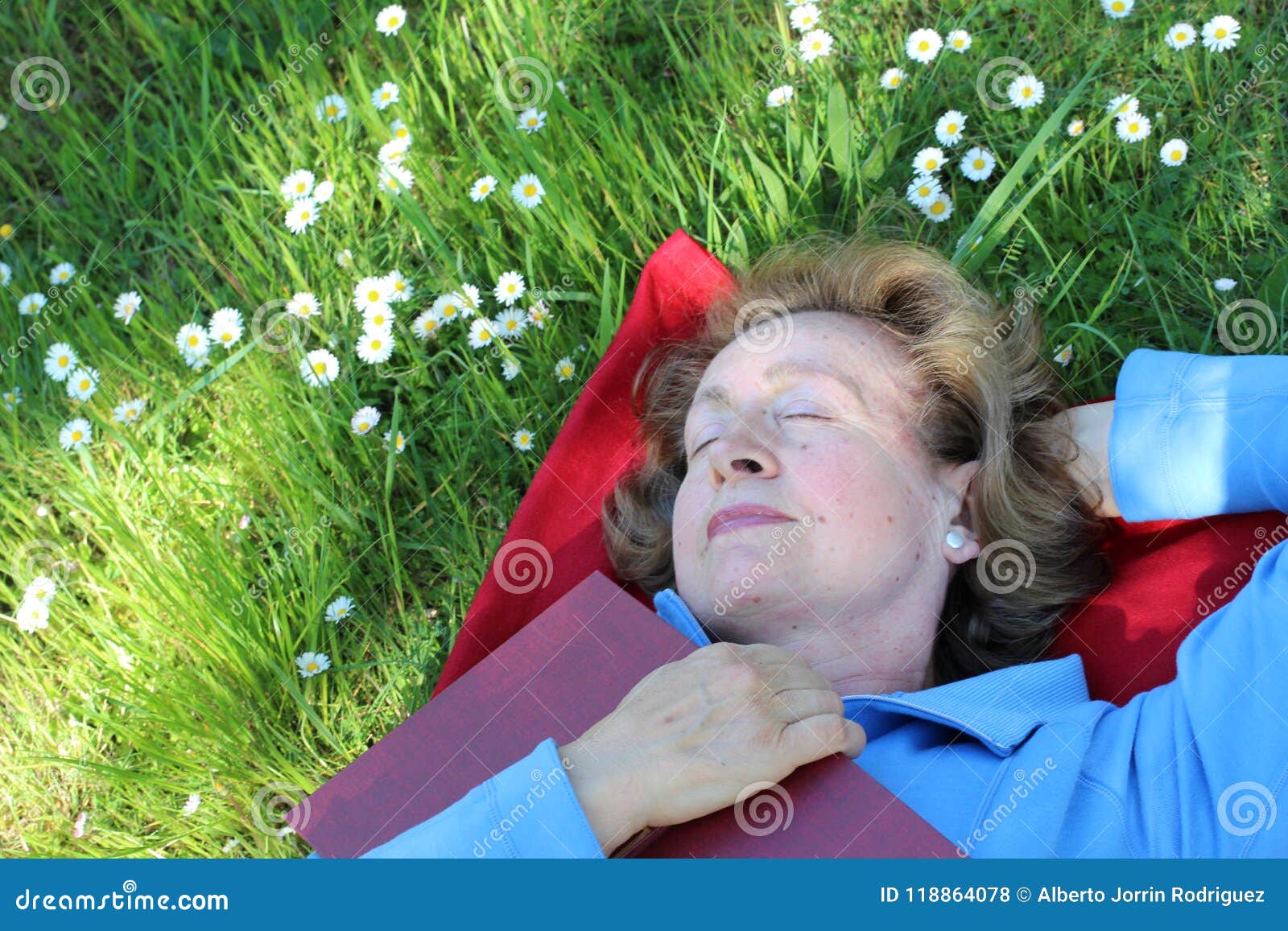 Lady taking a nap outdoors stock photo. Image of lifestyle - 118864078