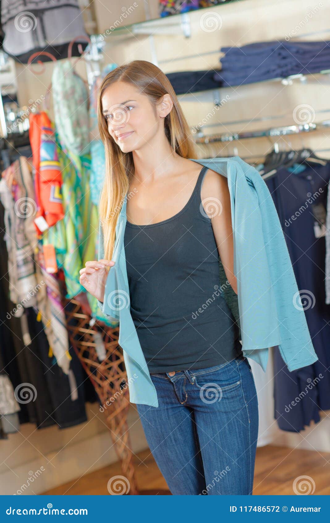 Lady Trying on Jacket in Clothes Store Stock Photo - Image of fashion ...