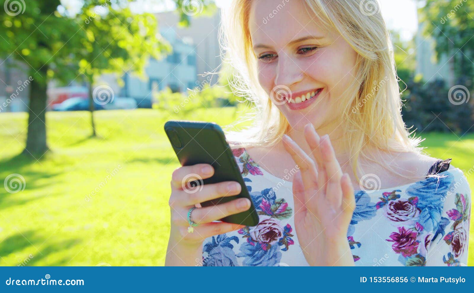 Lady Using a Phone Outdoors Stock Photo - Image of open, application ...