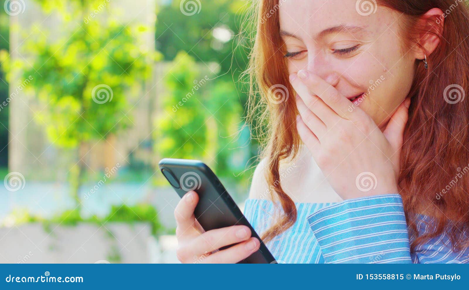 Lady Using a Phone Outdoors Stock Image - Image of city, beauty: 153558815