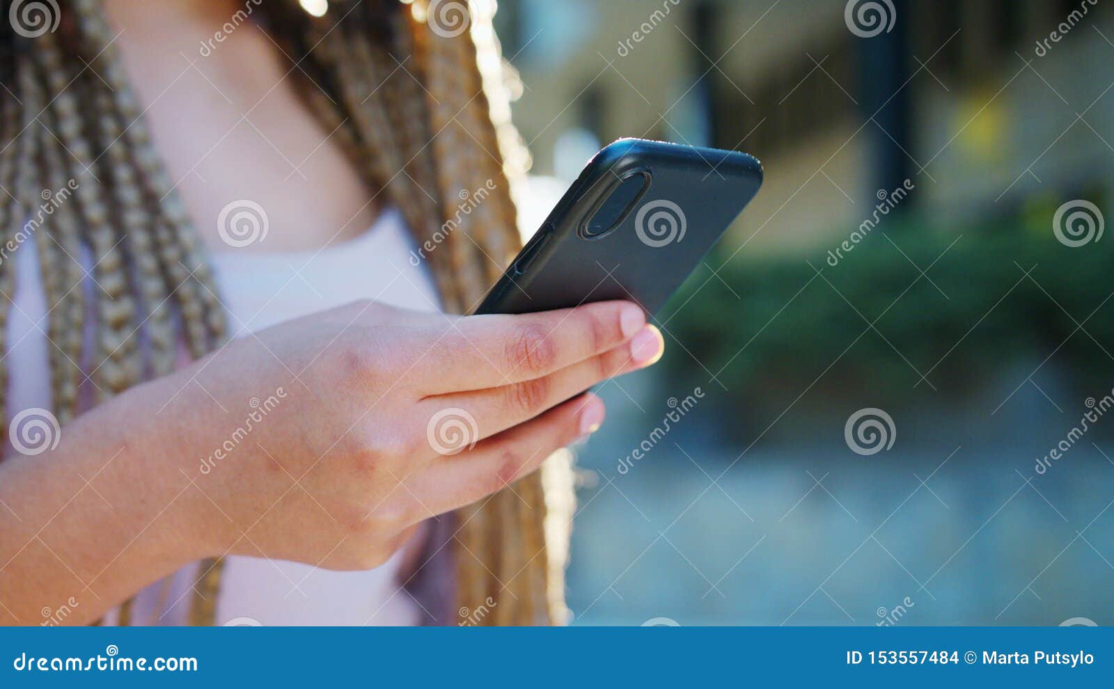 Lady Using a Phone Outdoors Stock Photo - Image of device, internet ...
