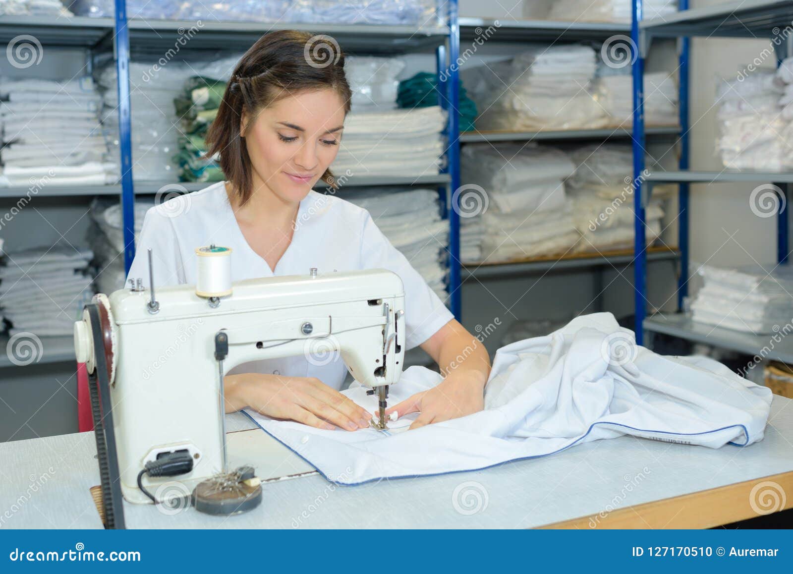 Lady using sewing machine stock photo. Image of detail - 127170510