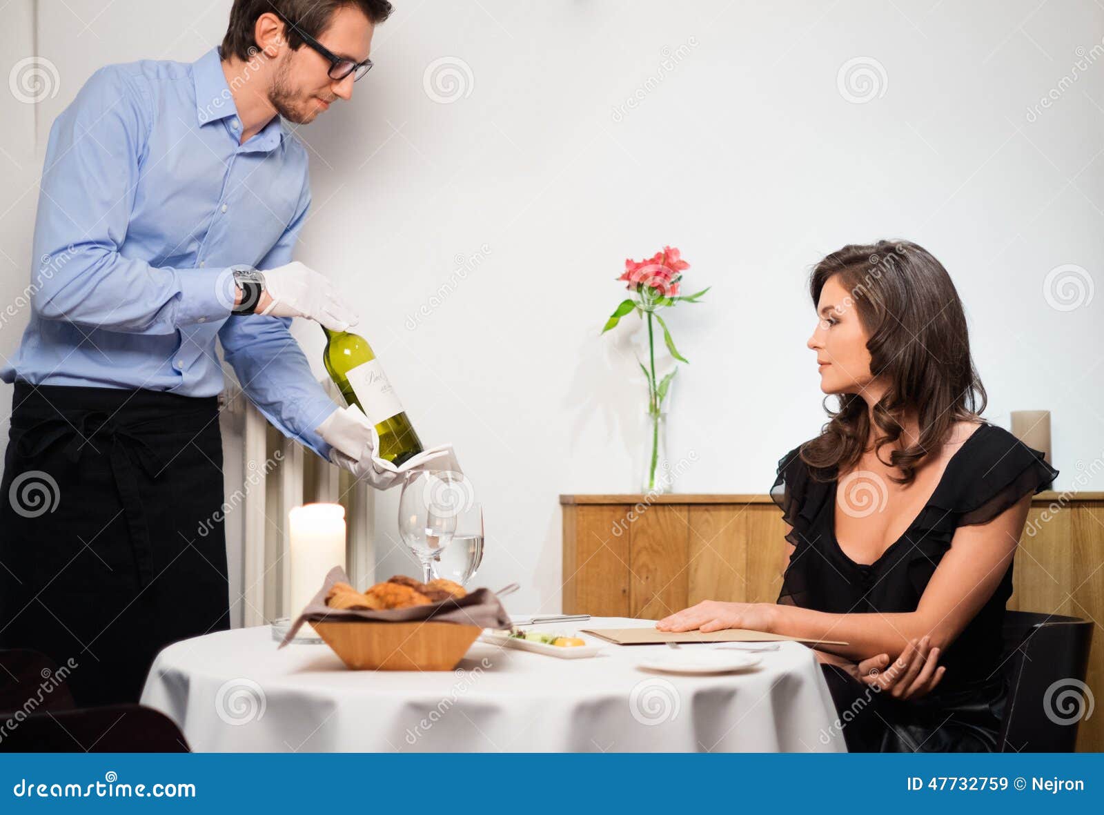 Lady and Waiter in Restaurant Stock Image - Image of alone, offering ...