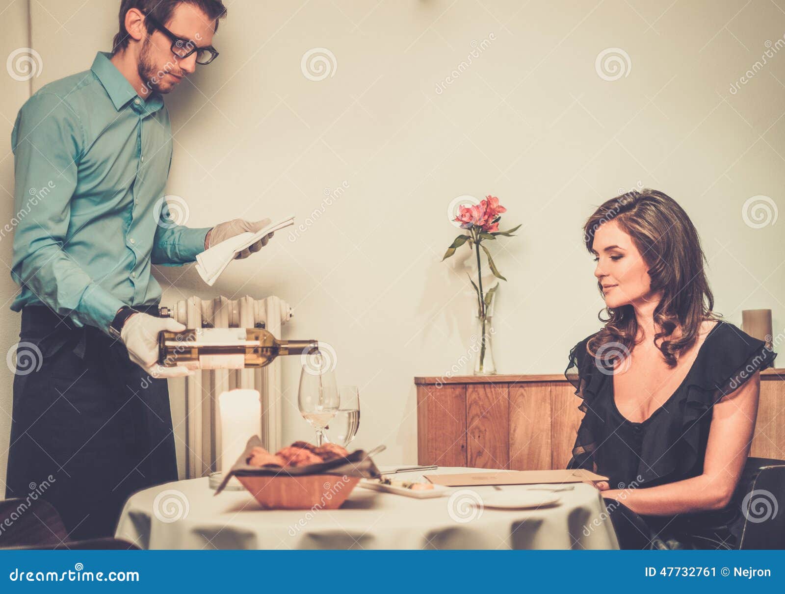 Lady and Waiter in Restaurant Stock Image - Image of meal, adult: 47732761