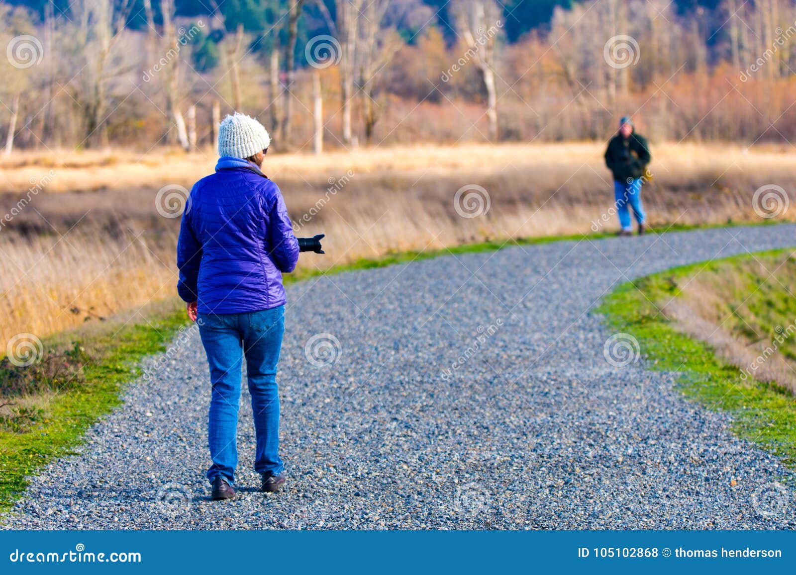Lady Walking with Camera in Hand. Editorial Stock Photo - Image of ...