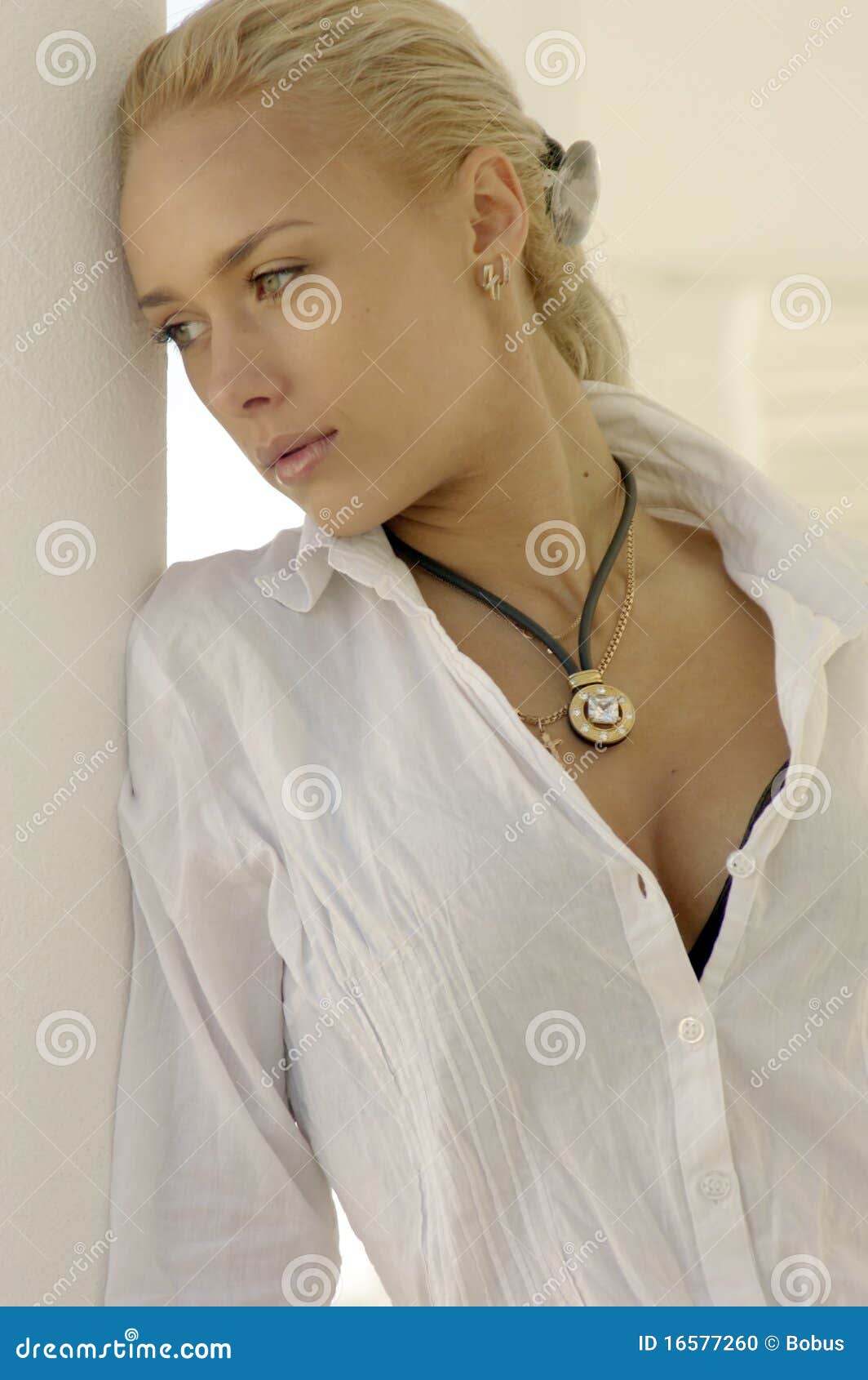 Lady in white looking left stock photo. Image of female - 16577260