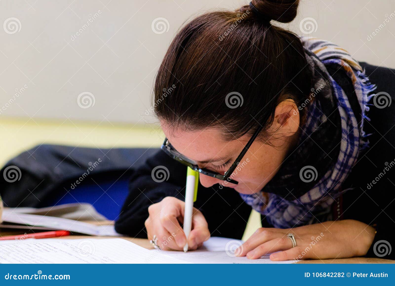 A Lady Writing Notes at a Desk Stock Photo - Image of friend ...