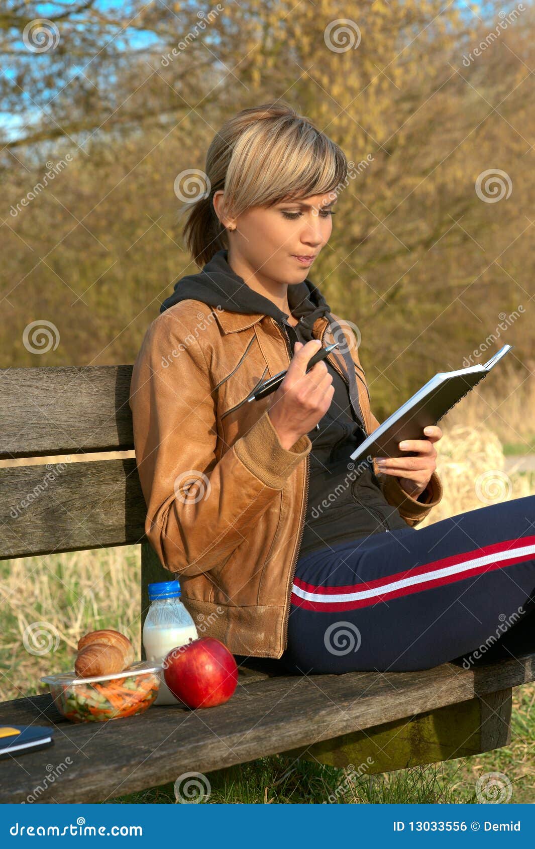 Lady Writing Outdoors stock photo. Image of letter, paper - 13033556