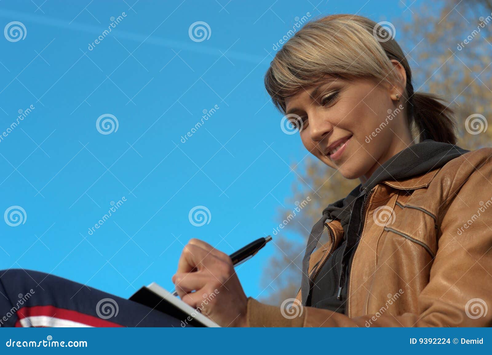 Lady Writing Outdoors stock photo. Image of park, inspiration - 9392224