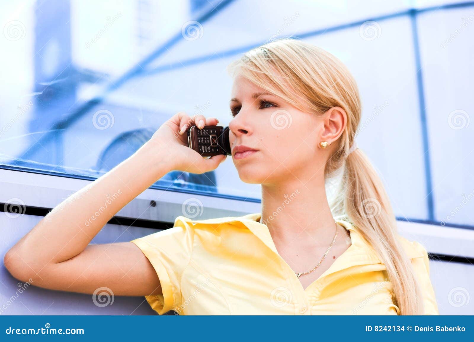 Lady in Yellow Talk by Phone Stock Photo - Image of city, girl: 8242134