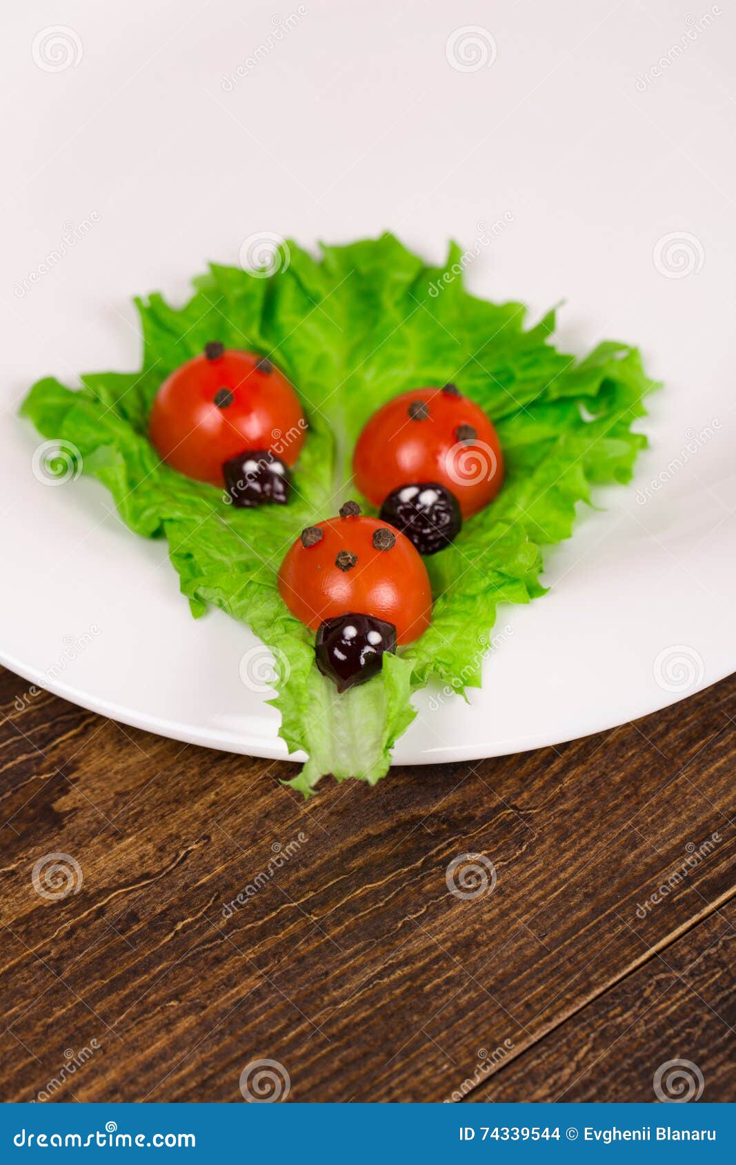 Ladybug Made of Raw Tomato on Lettuce Leaf Stock Photo - Image of ...