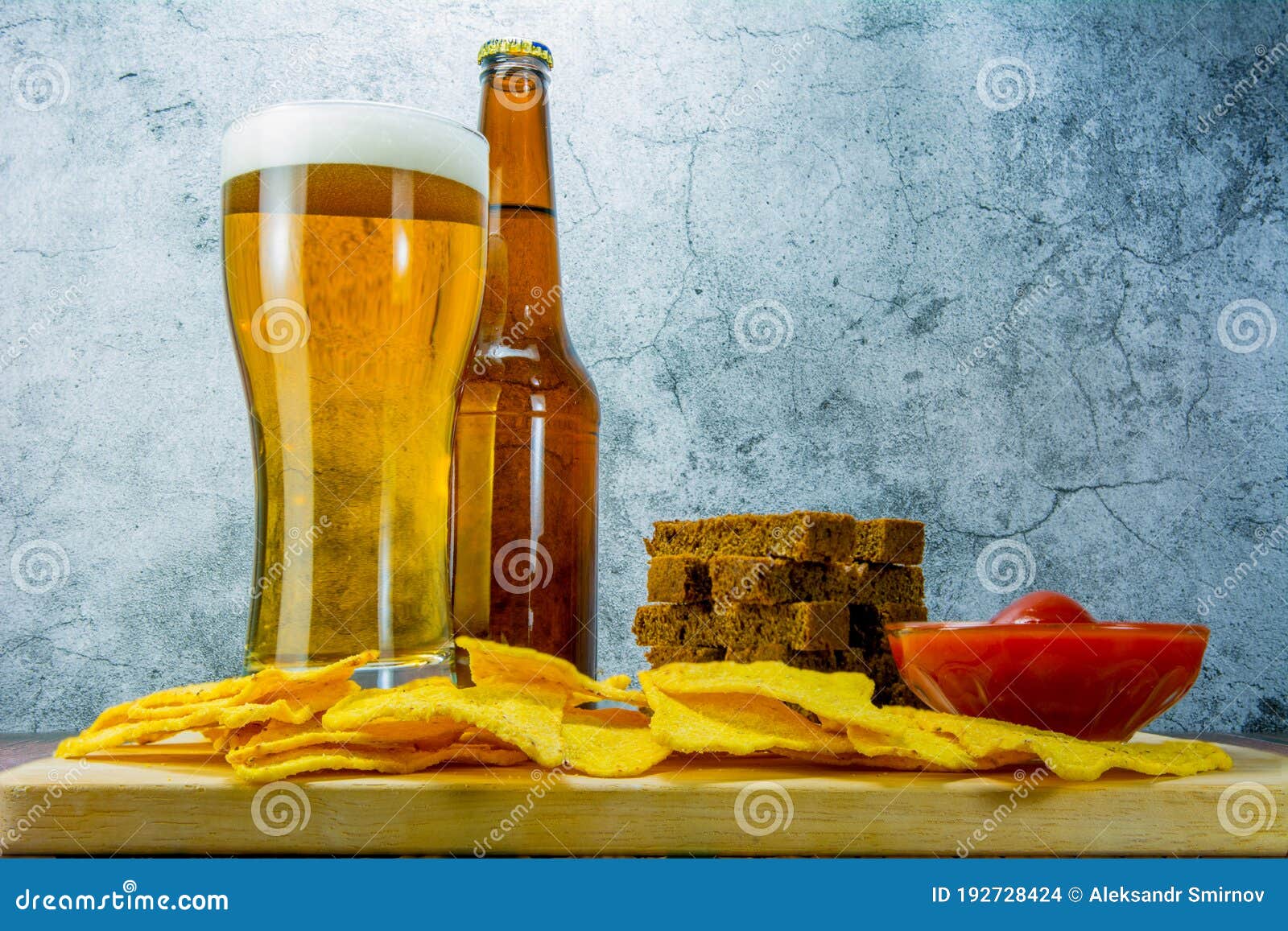 Lager Beer and Snacks on Stone Table. Cracker, Chips Side View Stock ...