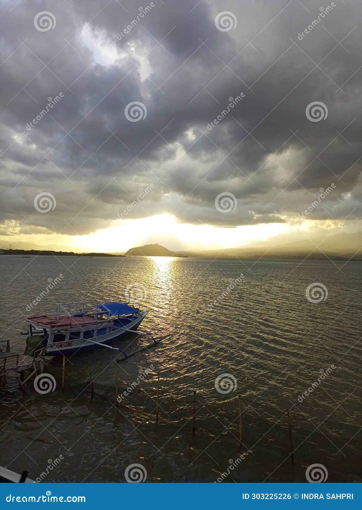 Lagit is Cloudy on a Quiet Beach Stock Photo - Image of lagit, cloudy ...
