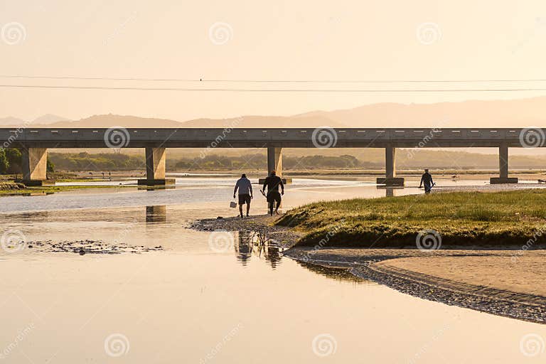 Lagoon Bridge And Bait Collectors At Sunrise At Uilenkraalsmond Stock Image Image Of Africa