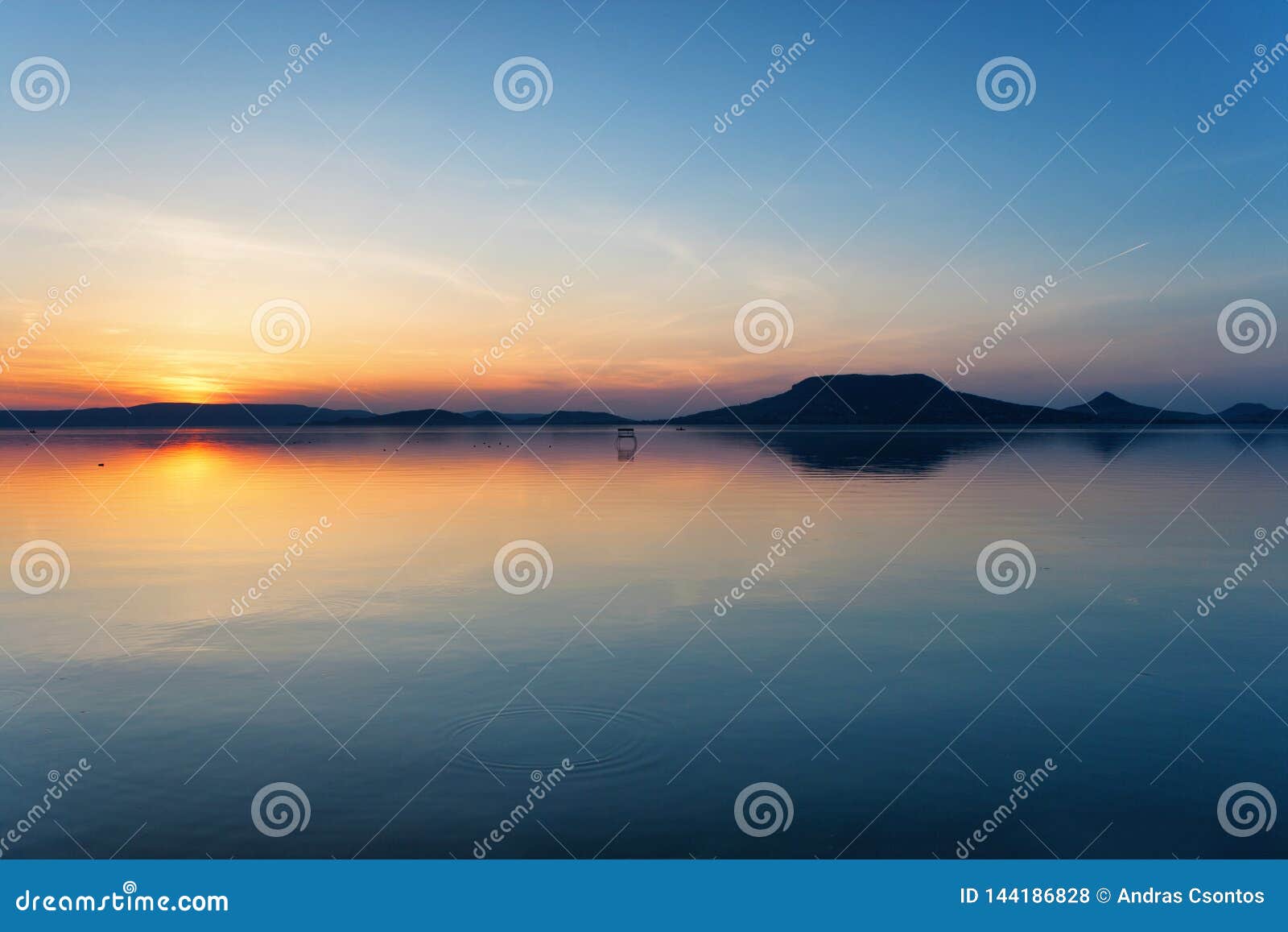 Lake Balaton after Sunset with the Badacsony Mountains Id Stock Photo ...