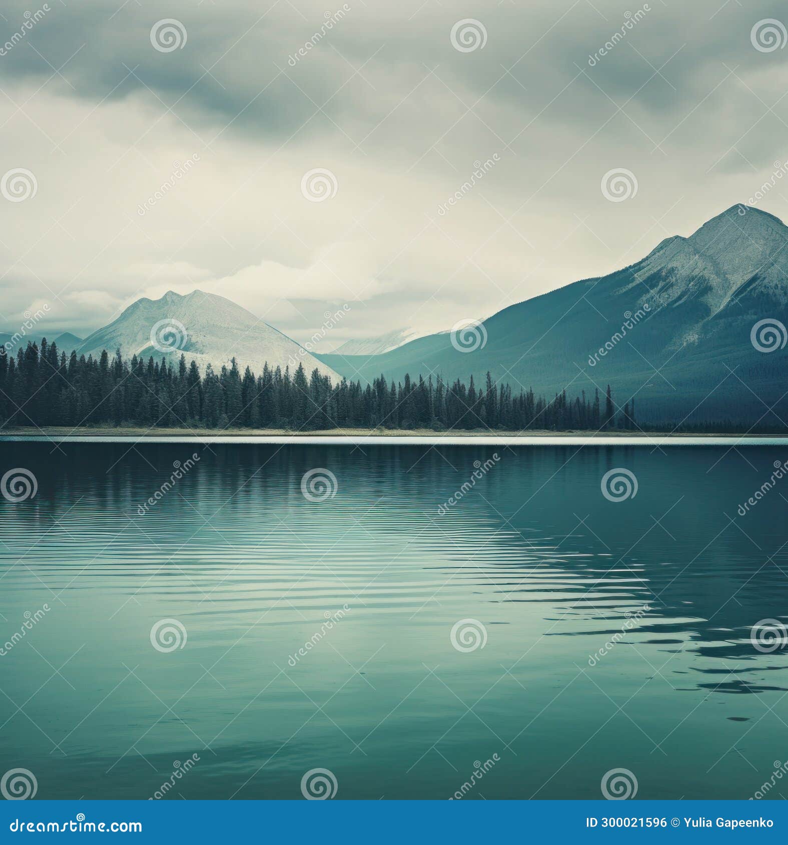 The Lake is Calm with Mountains in the Background Stock Photo - Image ...