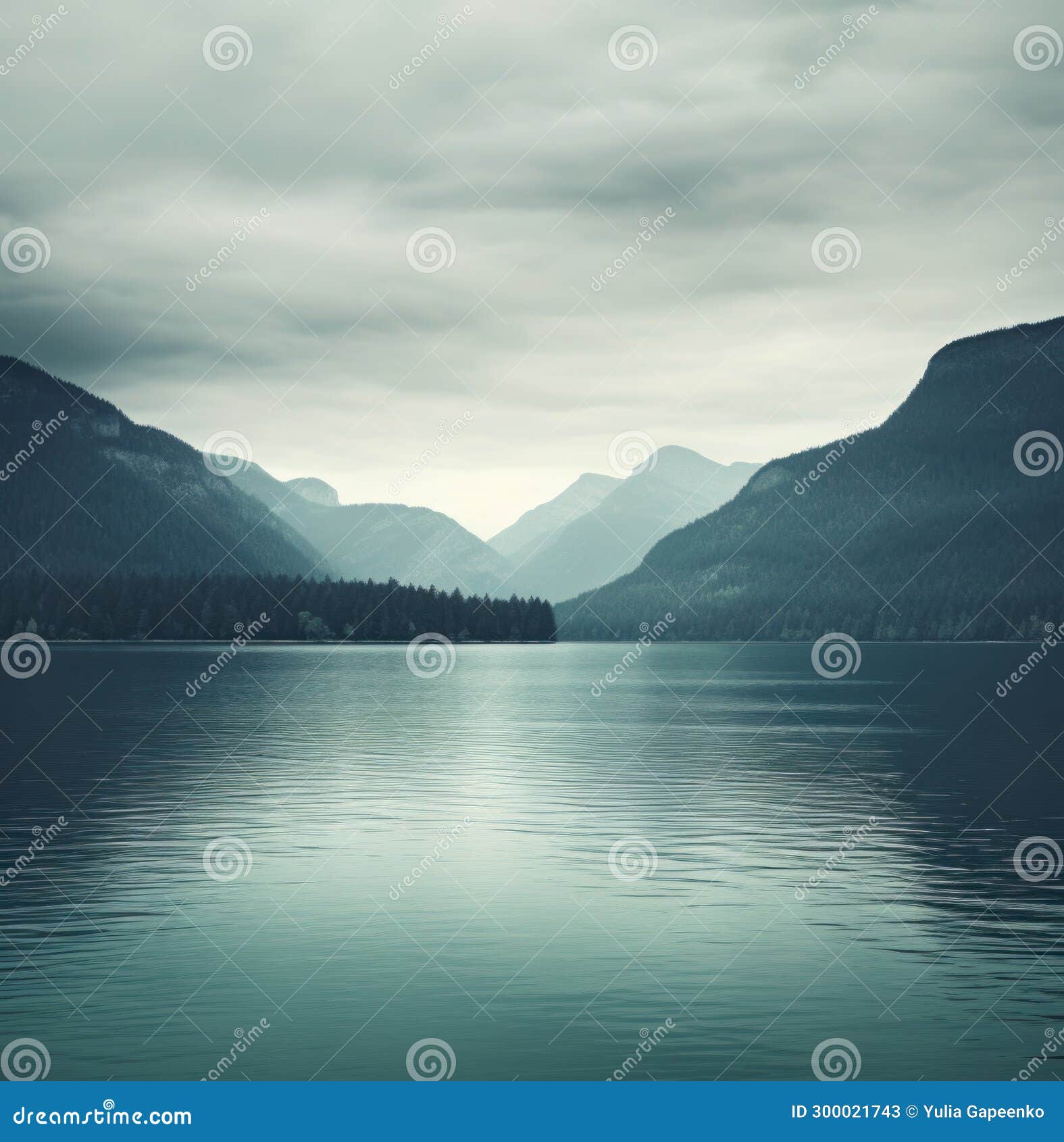 The Lake is Calm with Mountains in the Background Stock Image - Image ...