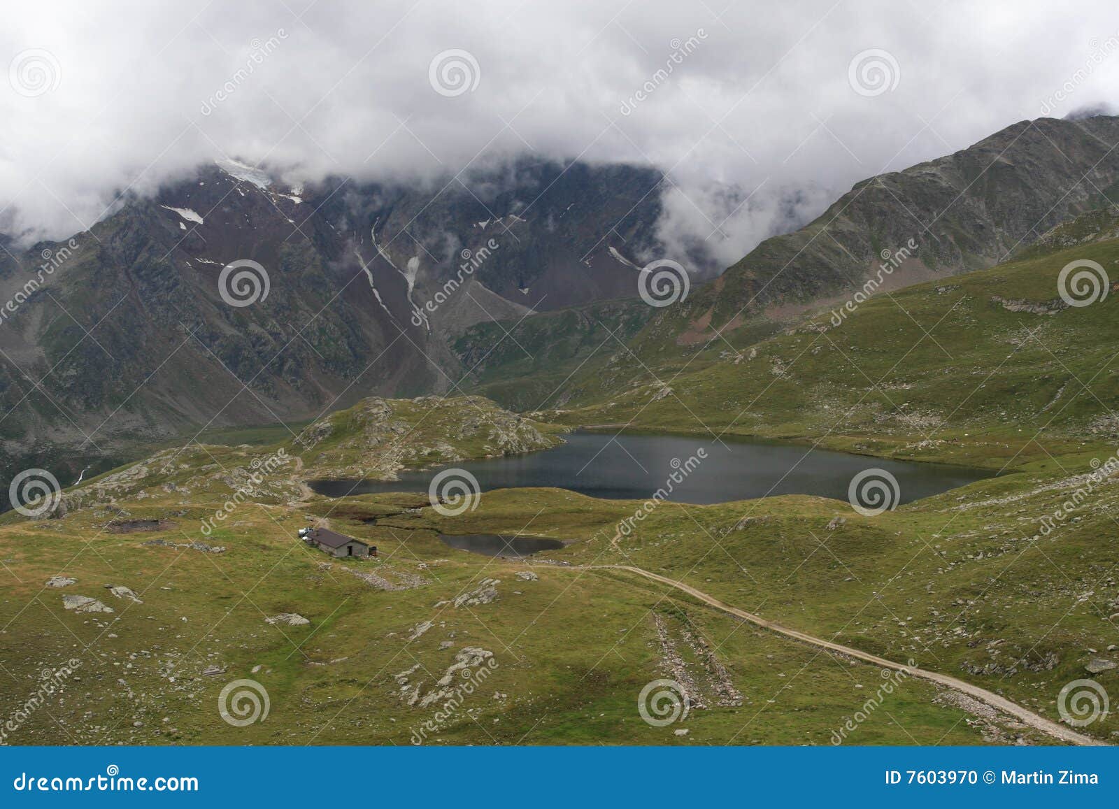 Lake close to Passo Gavia stock photo. Image of wild, grass - 7603970