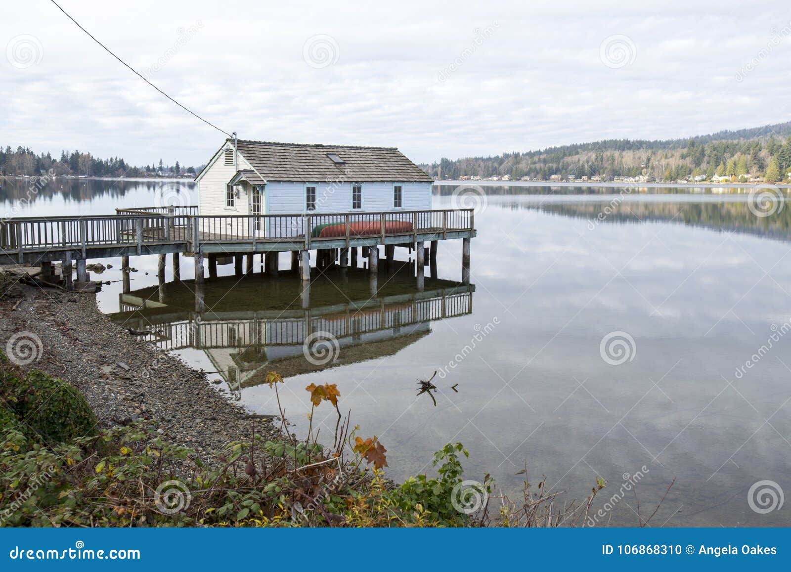 Lake House on pier stock photo. Image of water, white - 106868310