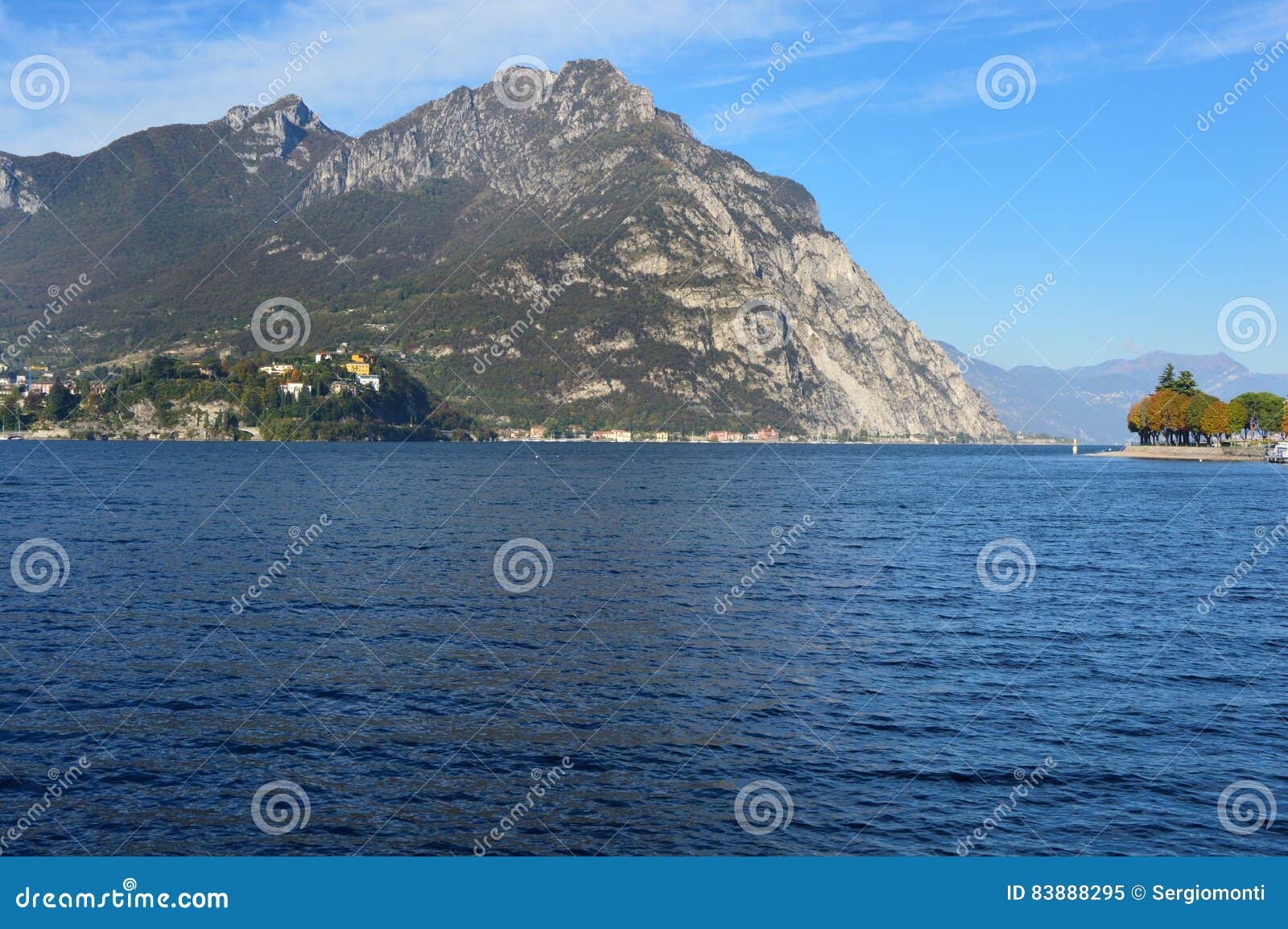 Lake Lecco in fall, Italy stock image. Image of flag - 83888295