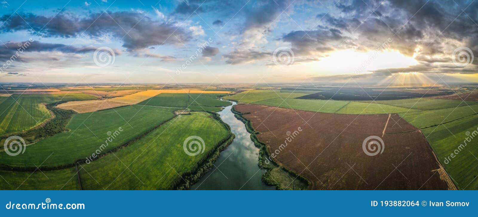The Lake in the Middle of Endless Green Fields Stock Photo - Image of ...