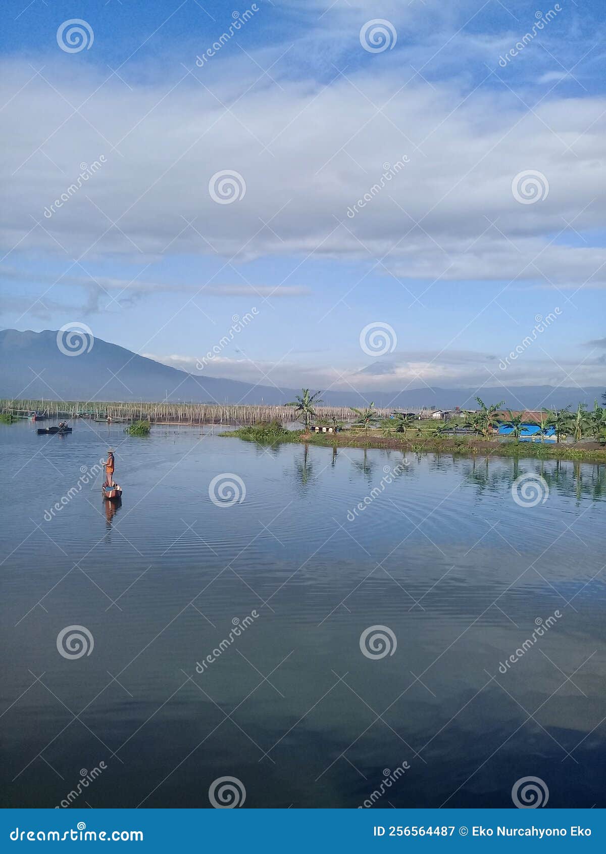 Lake Rawa pening Blue sy stock image. Image of green - 256564487