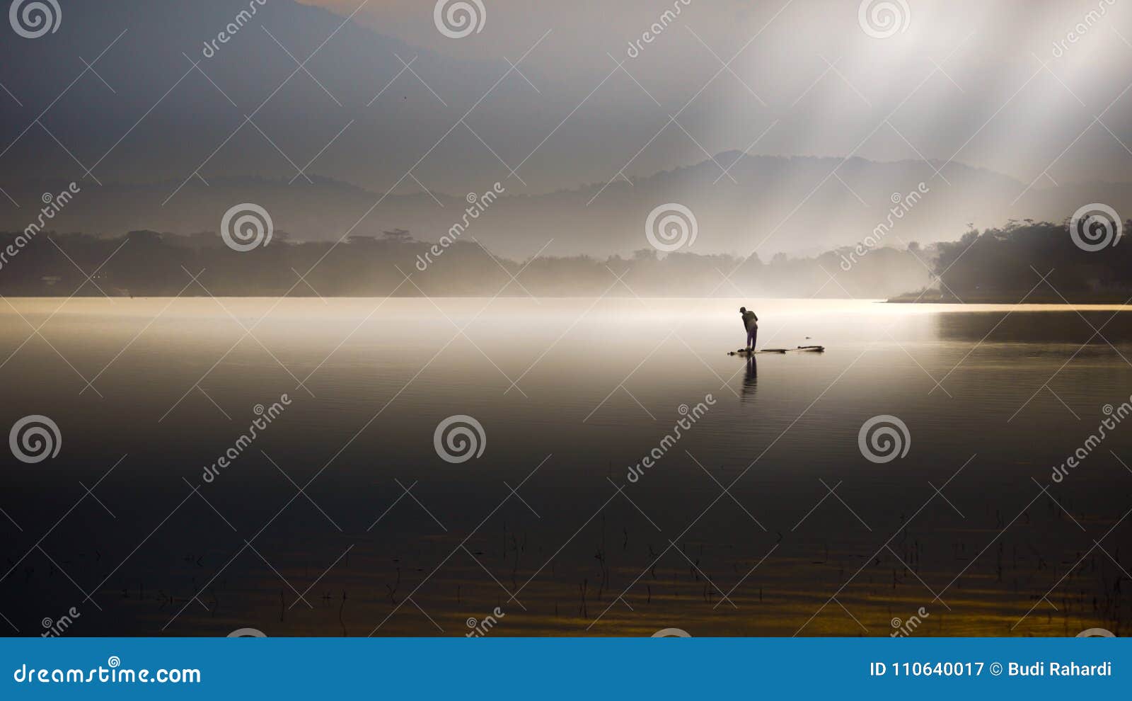 Lake with Ray of light stock image. Image of floating - 110640017