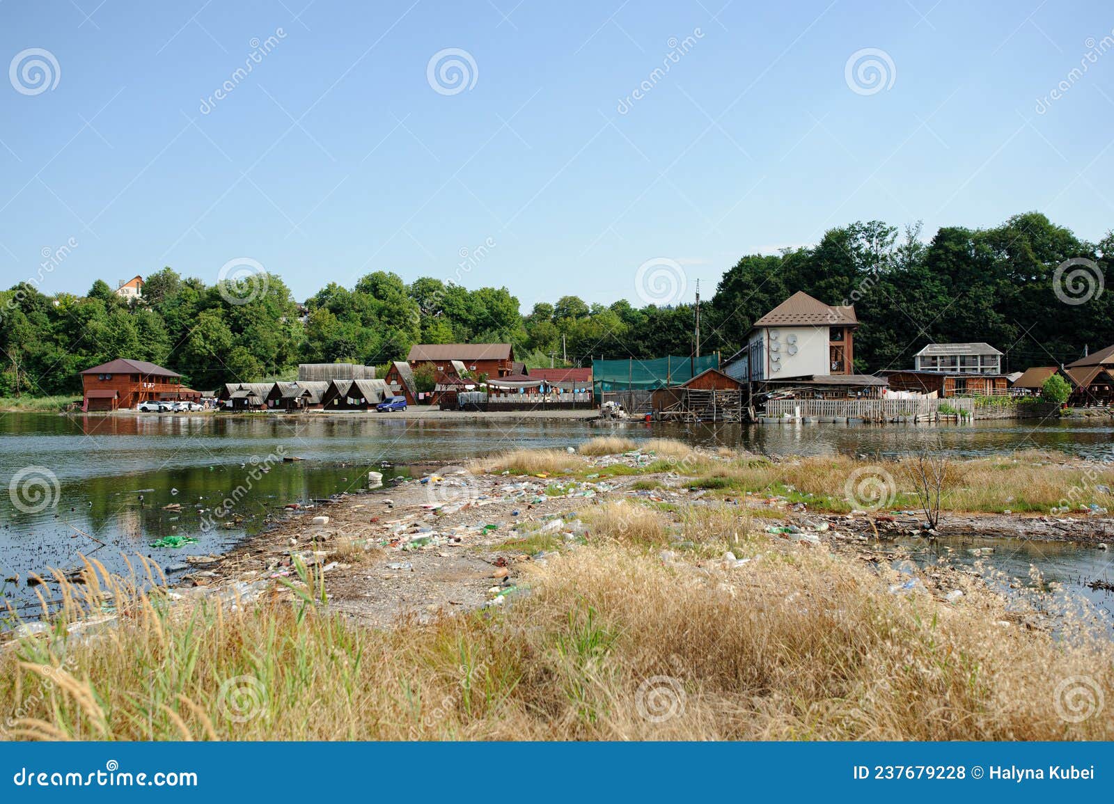 The Lake and the Shore are Littered with Garbage Stock Photo - Image of ...