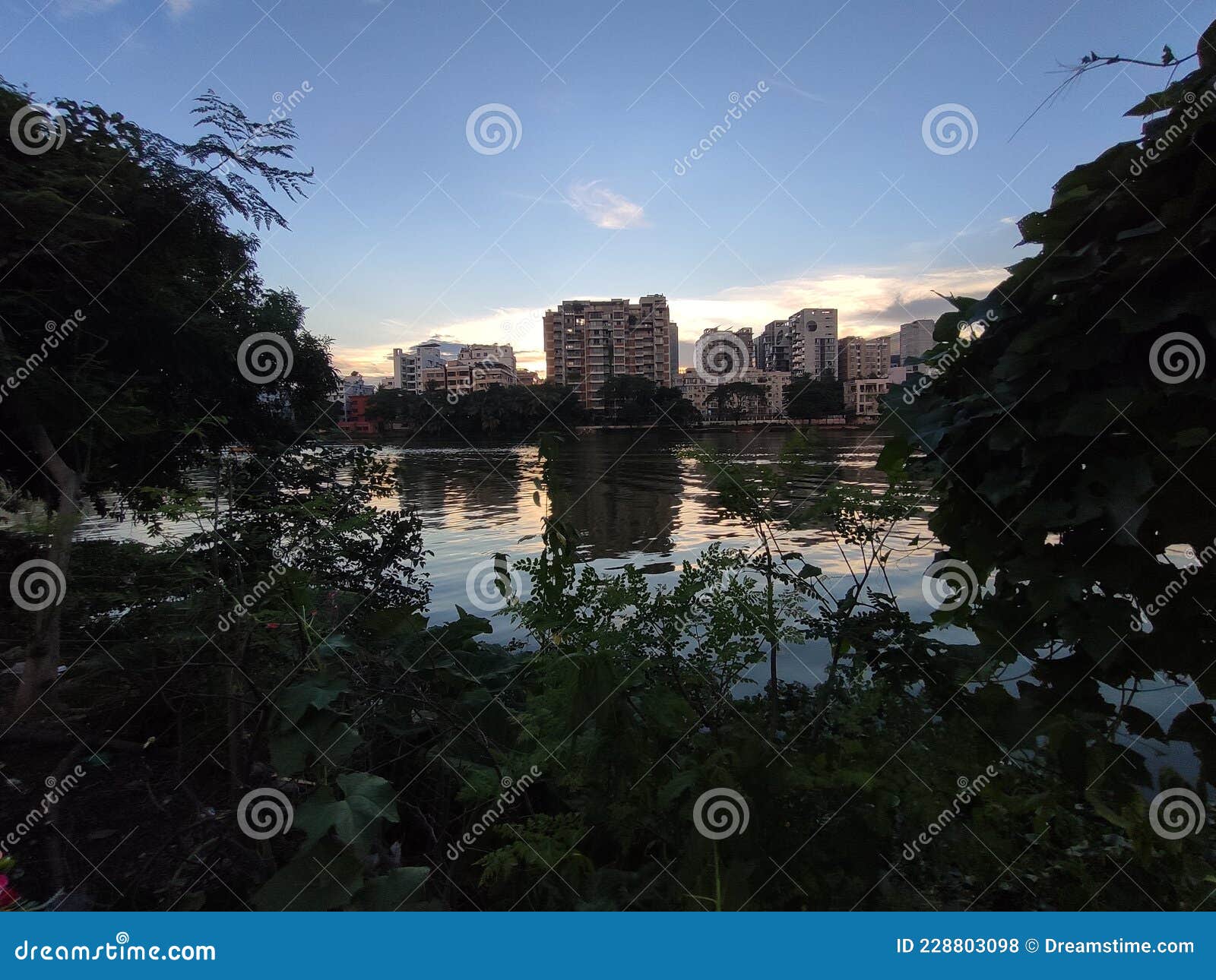 Lake side city stock photo. Image of reflection, landmark - 228803098