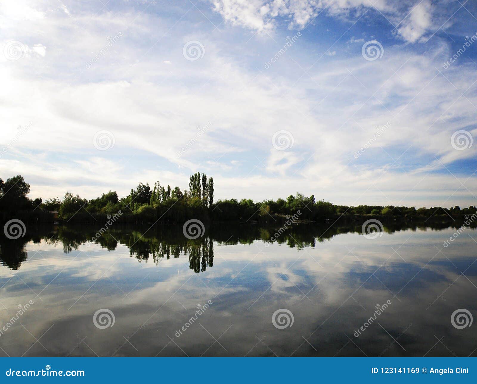 Lake with Sky and Clouds Reflecting in Tranquil River Stock Image ...