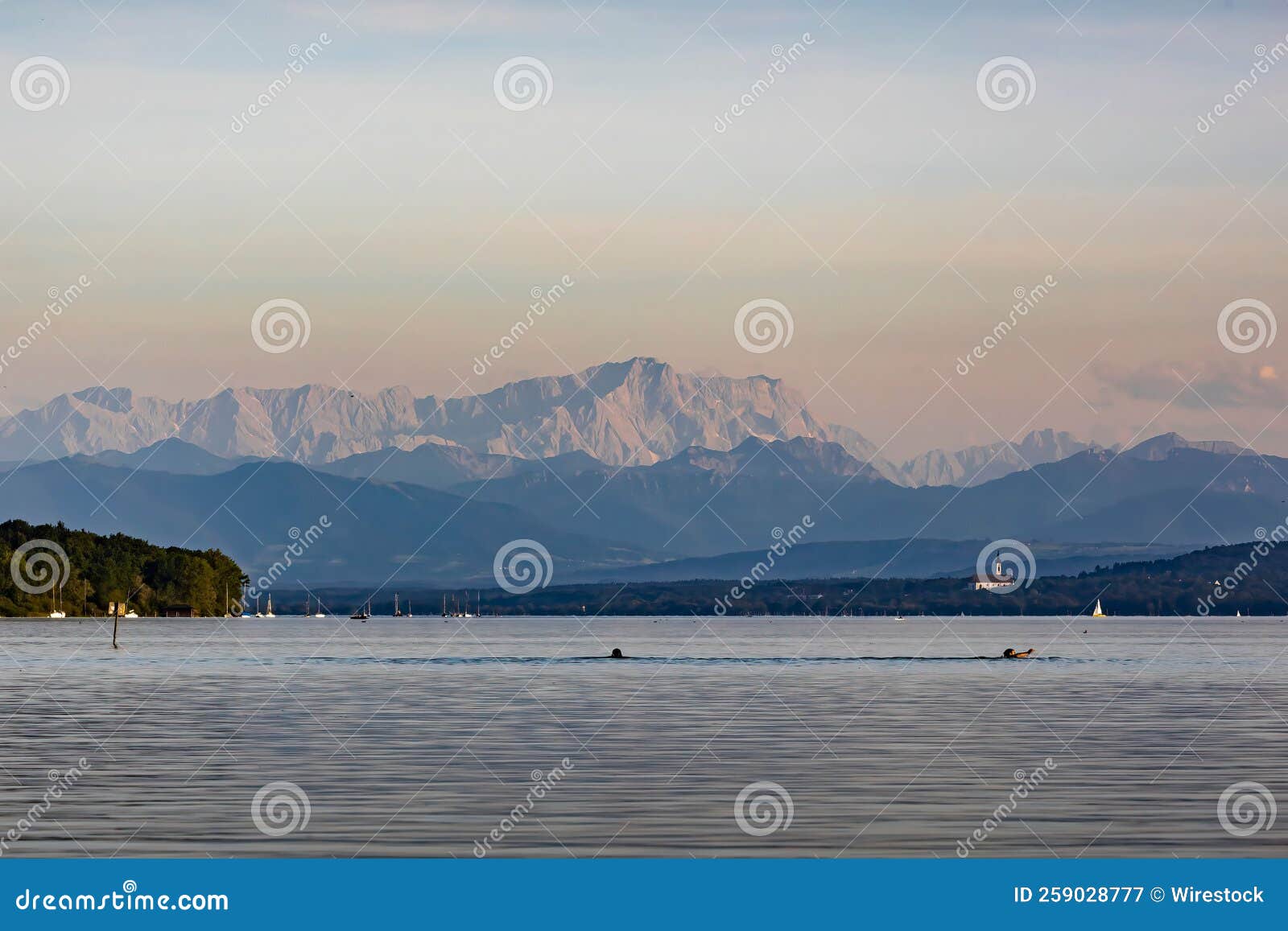 Lake Starnberg in Germany with Snowcap Mountains in the Background ...