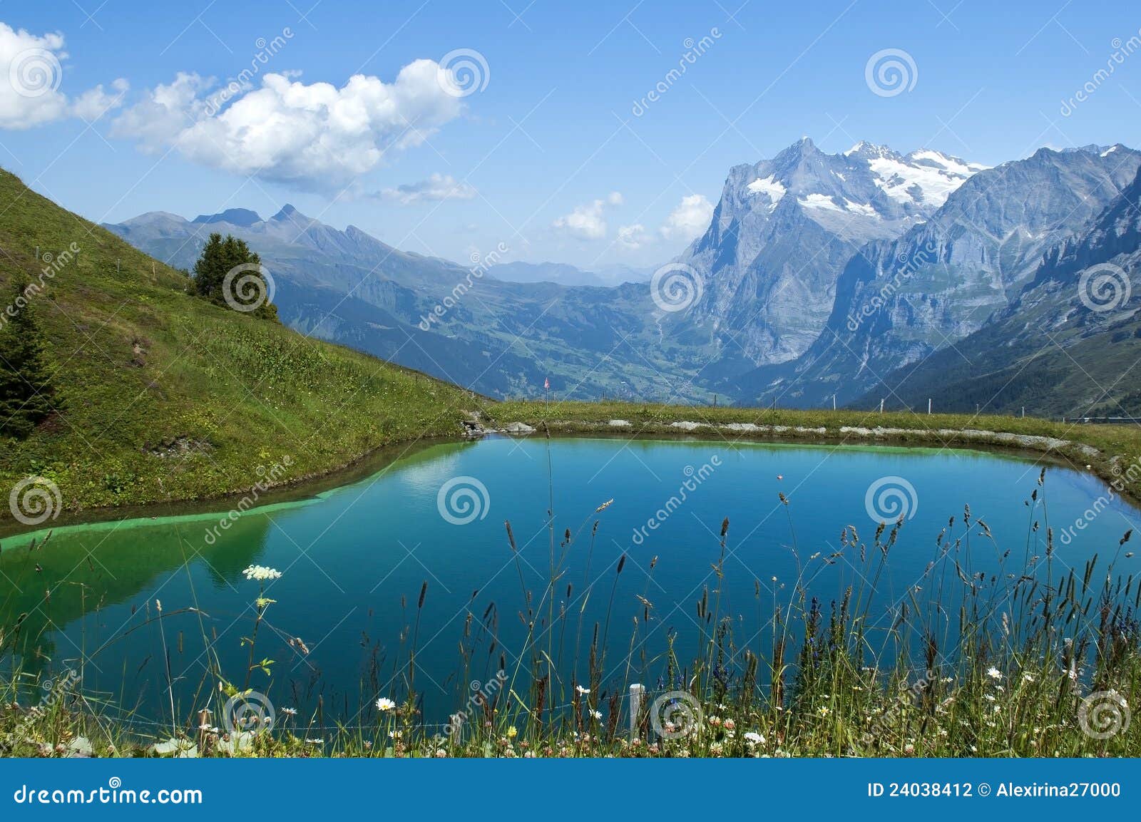 Lake in the Swiss Alps stock photo. Image of clouds, forest - 24038412