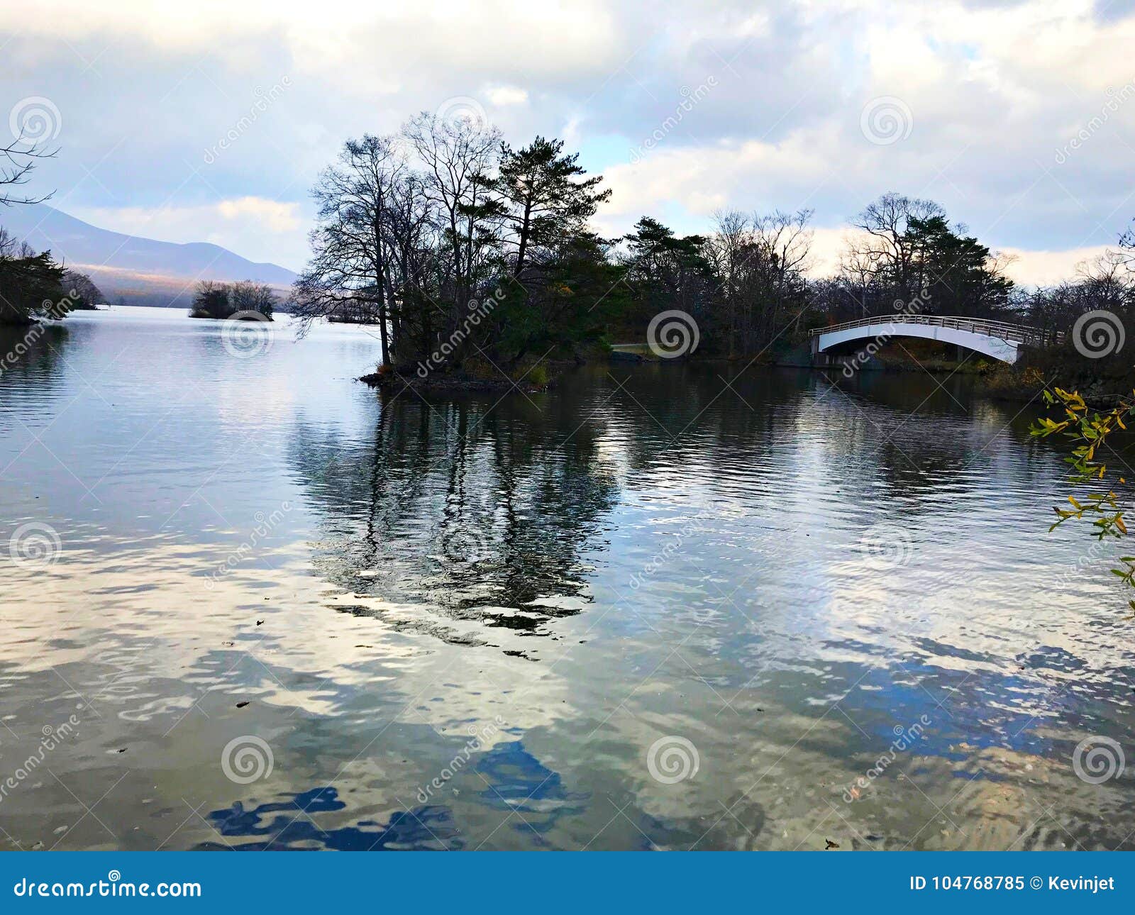 Blue Sky, Bridge and the Reflection of the Lake Stock Image - Image of ...