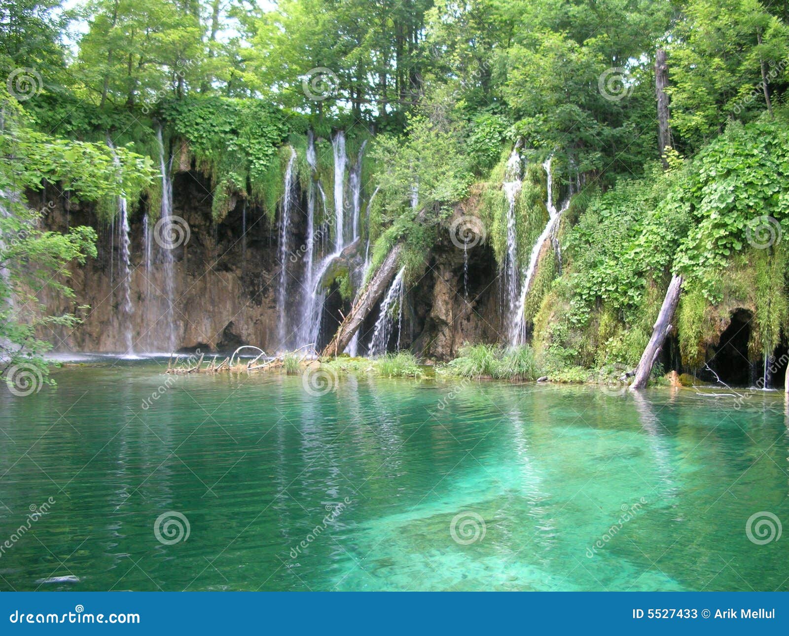 Lake with waterfalls stock image. Image of water, tree - 5527433