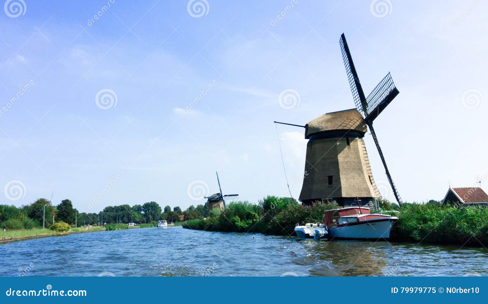 Lake with a Windmill Next To it. Editorial Image - Image of sailing ...