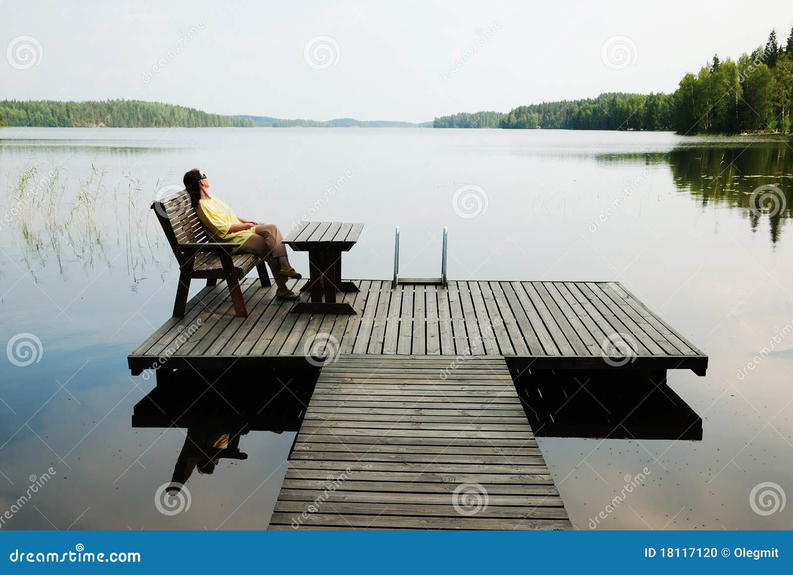 Lake with Wooden Platform and Woman Resting. Stock Photo - Image of ...