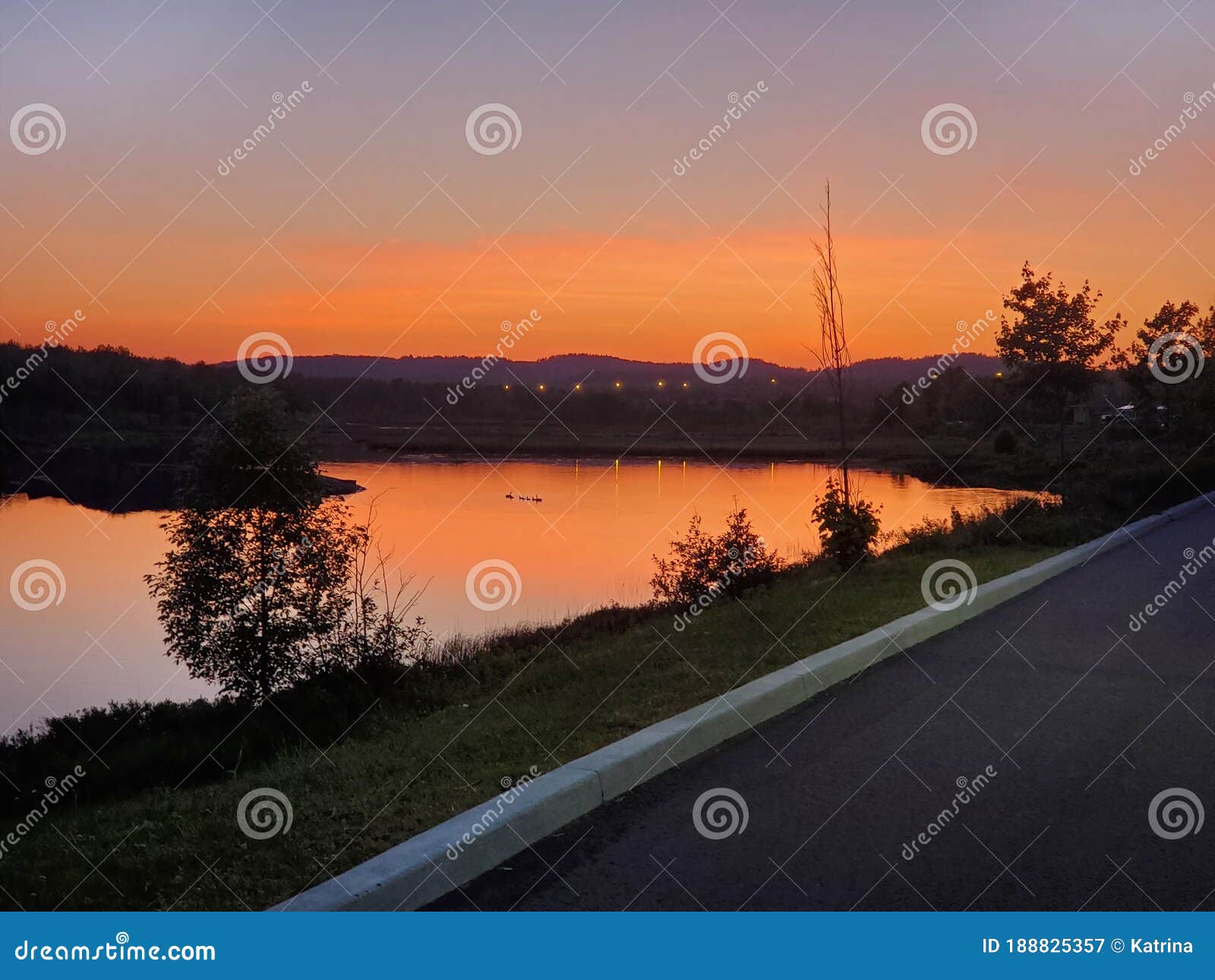 Lakeshore sunset stock image. Image of evening, beach - 188825357