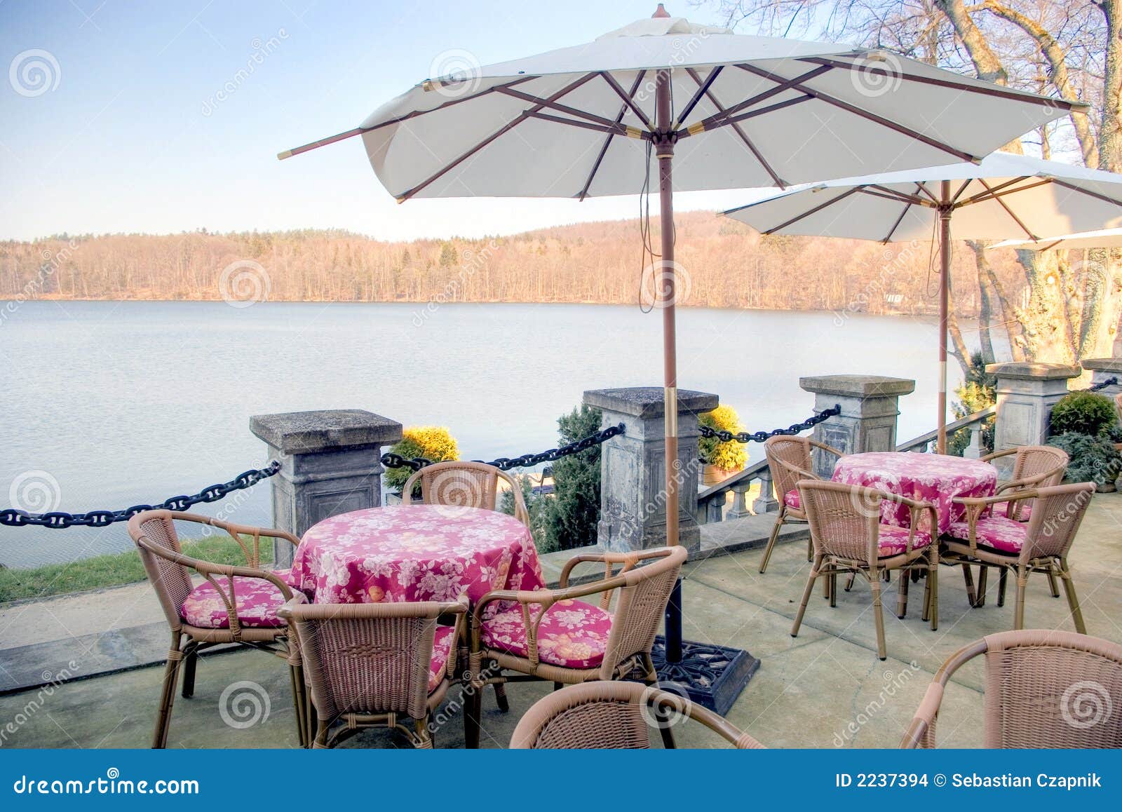 Lakeside cafe tables stock photo. Image of podewils, parasols - 2237394