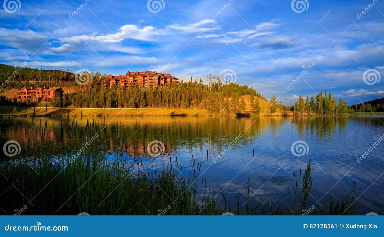 Lakeside stock image. Image of house, sundown, grass - 82178561