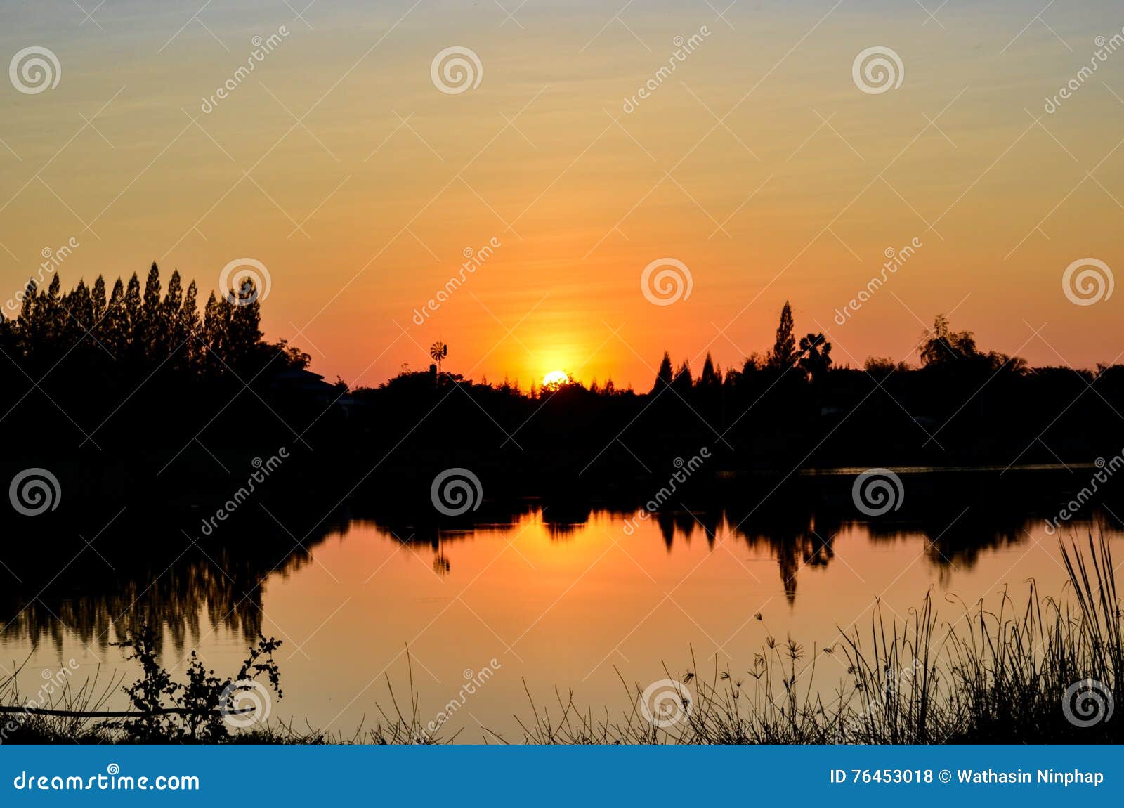 Lakeside sunsets stock photo. Image of park, color, lake - 76453018