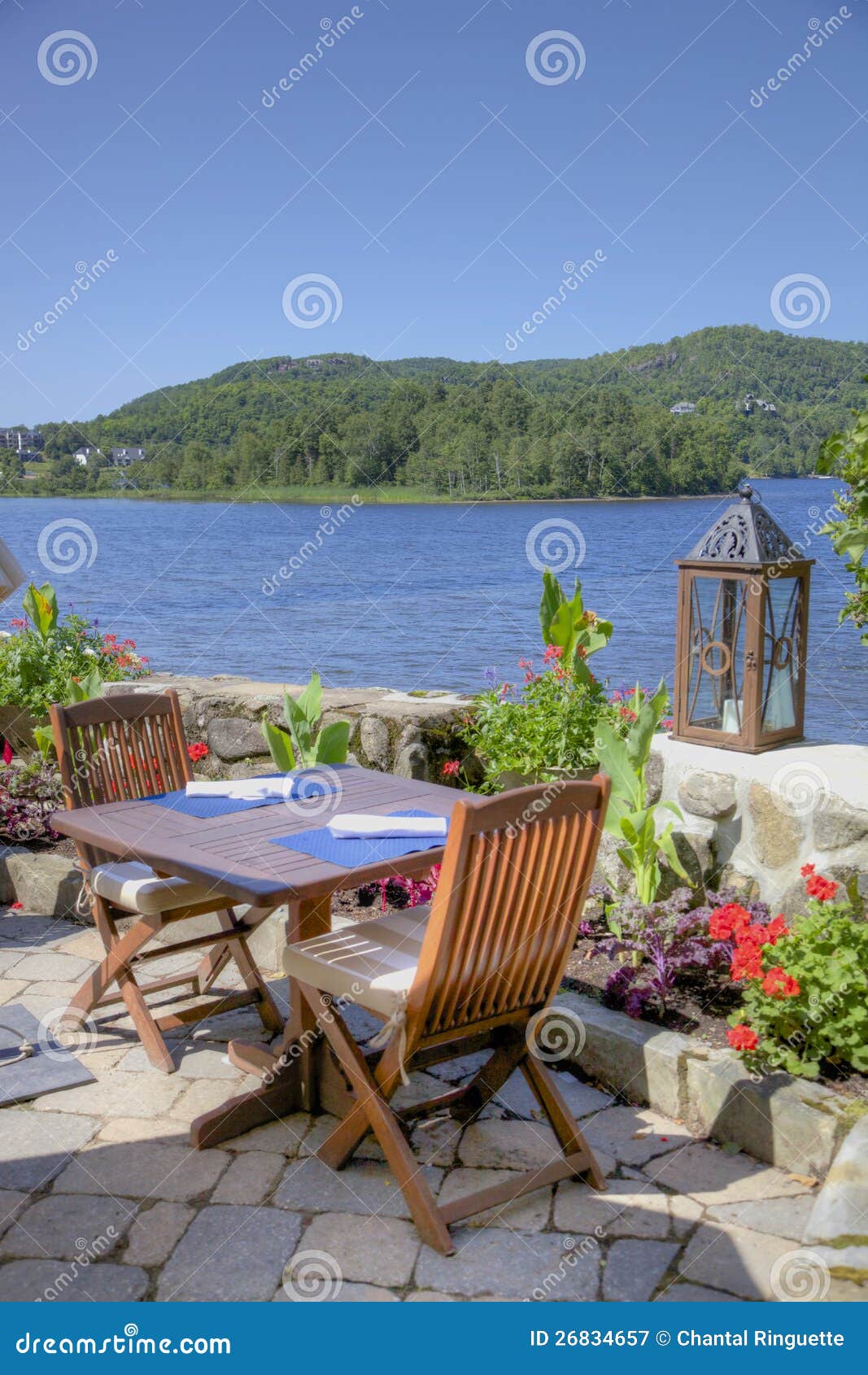 Lakeside table for two stock image. Image of napkins - 26834657