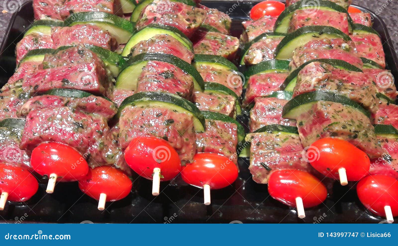 Lamb Fillet in Marinade with Fresh Zucchini and Mini Tomato Stock Image ...