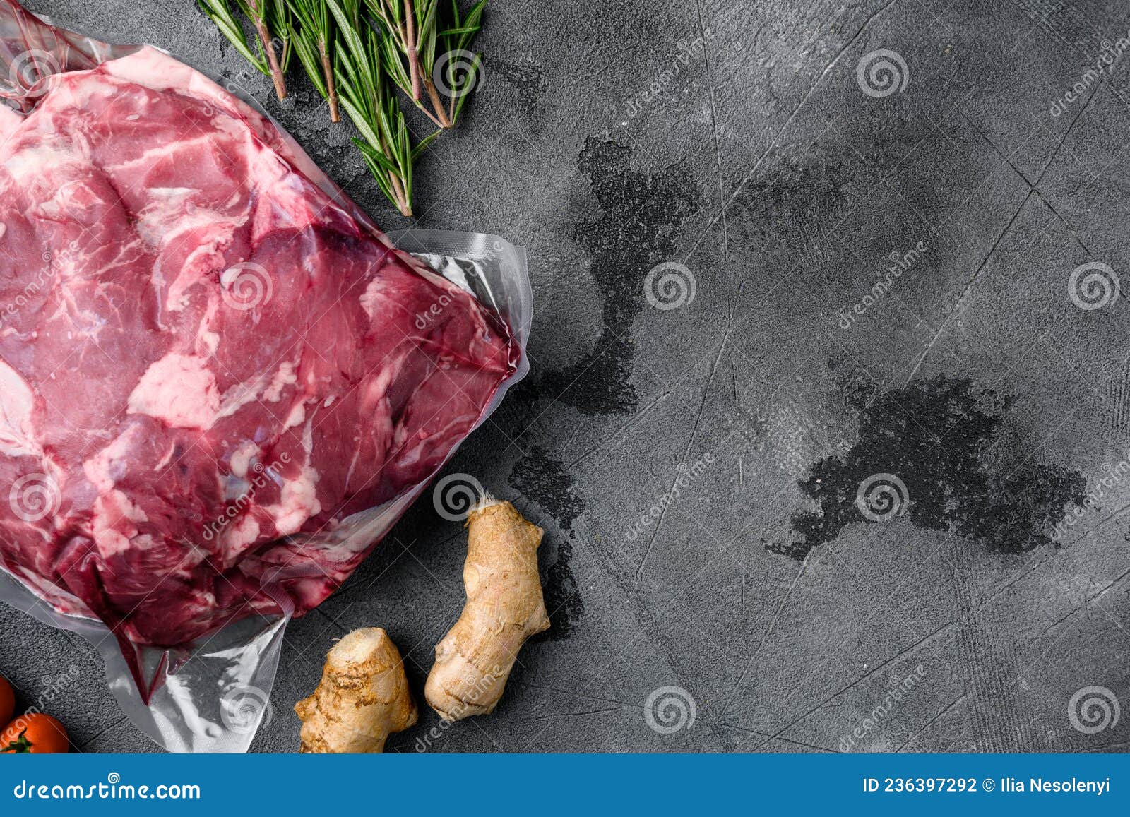 Lamb Meat Raw Pack, with Ingredients and Herbs, on Gray Stone Table ...