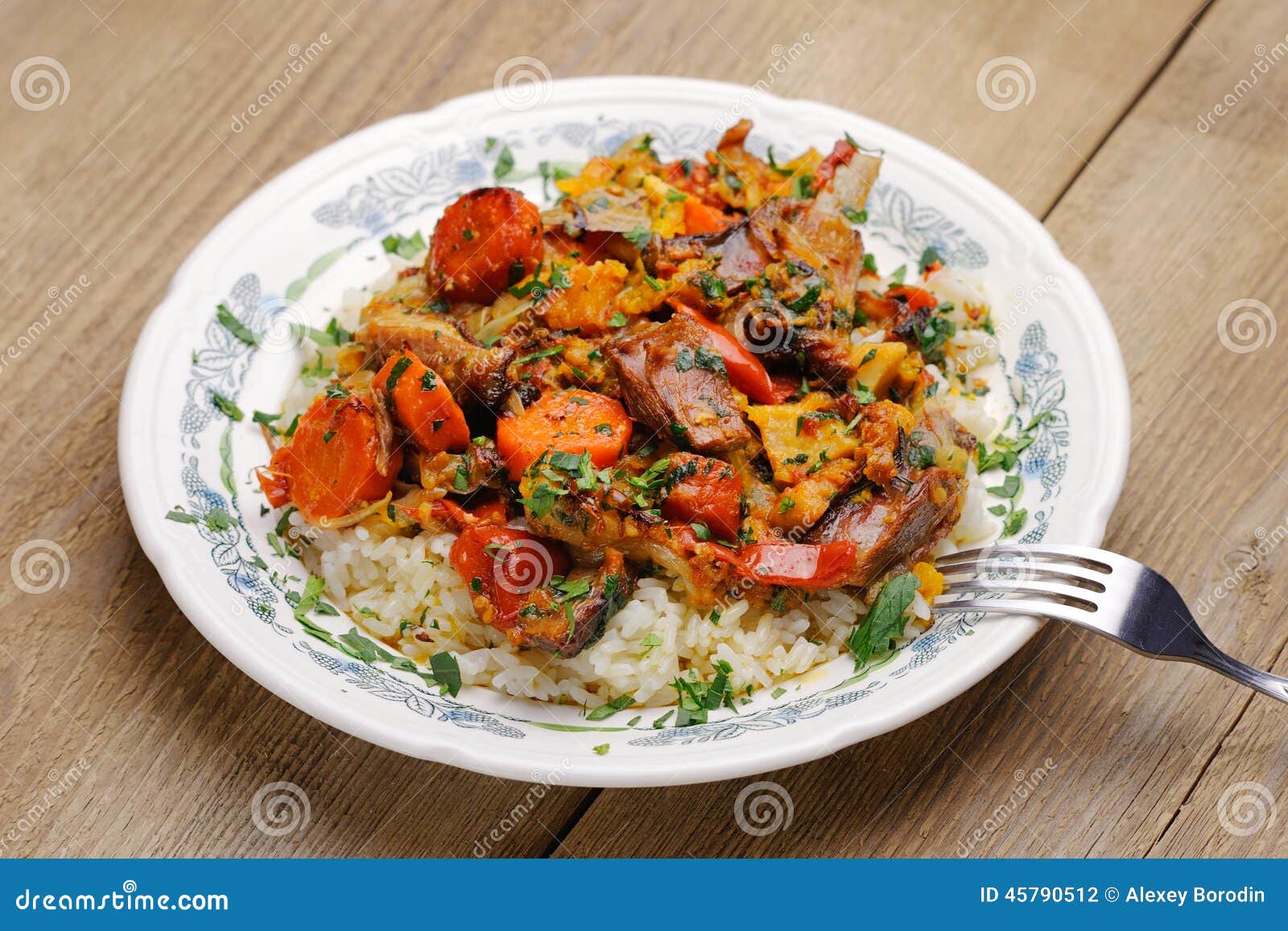 Lamb Ragout with Vegetables and Rice in White Plate Stock Photo - Image ...