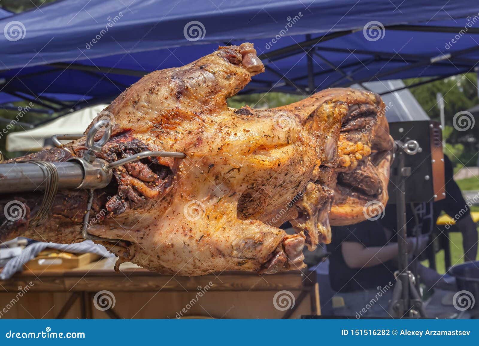 Lamb is Roasted on a Skewer Over Burning Charcoal. Stock Photo - Image ...