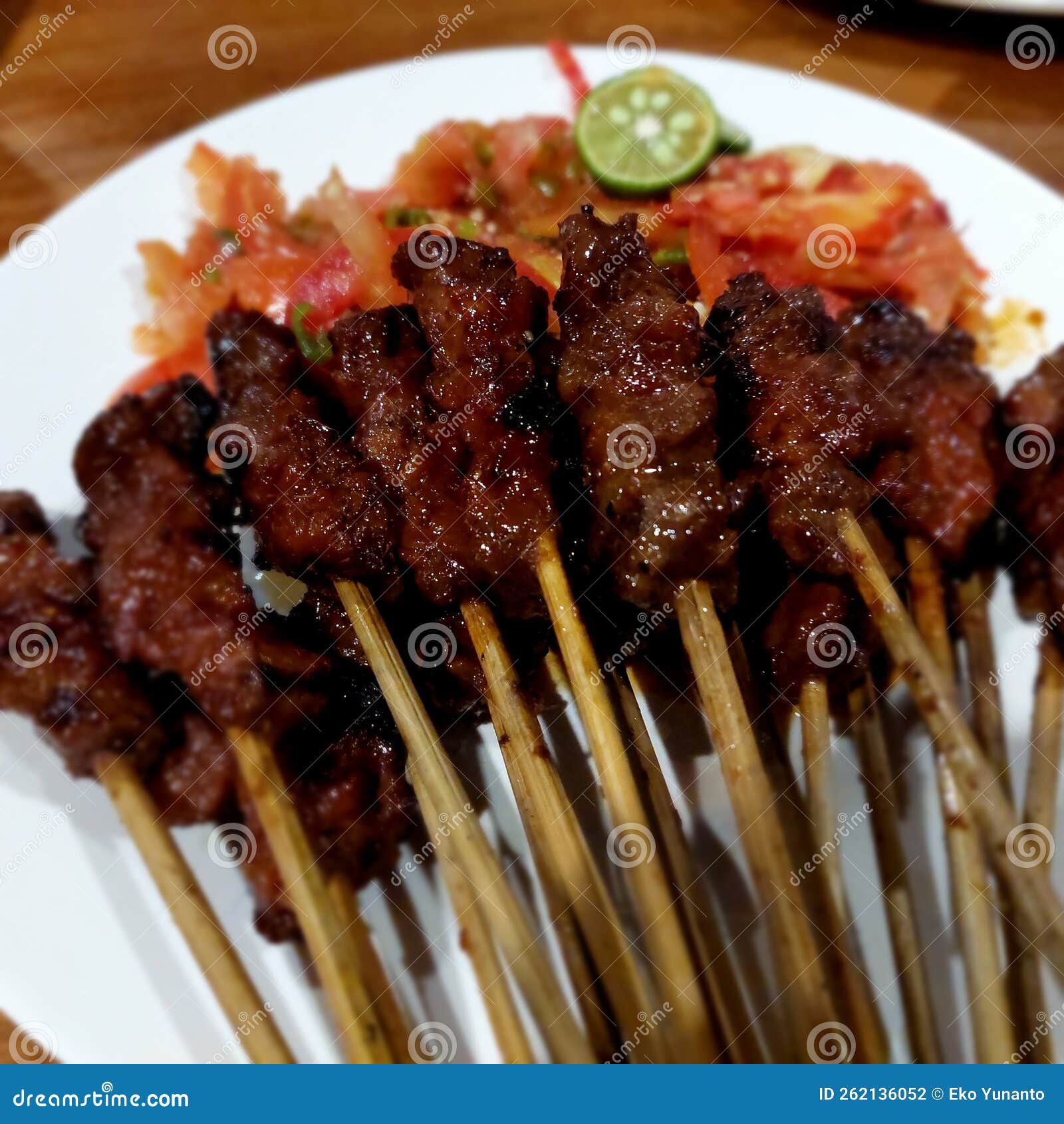Lamb Satay that Has Been Grilled and Served with Tomatoes, Chilies and ...