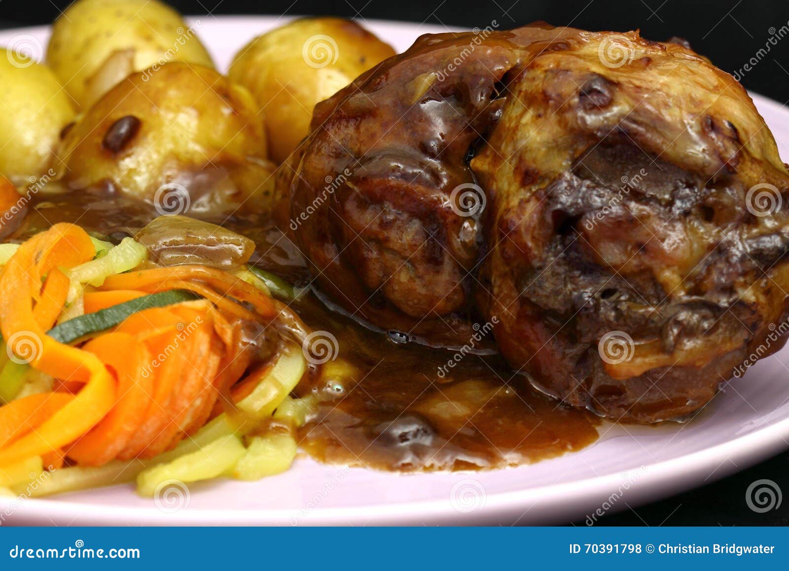 Lamb shank dinner meal stock photo. Image of gravy, braised - 70391798