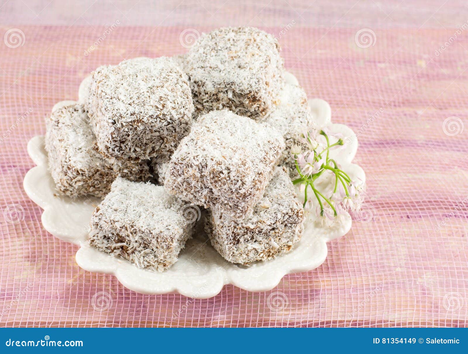 Lamingtons on a plate stock image. Image of indulgence - 81354149